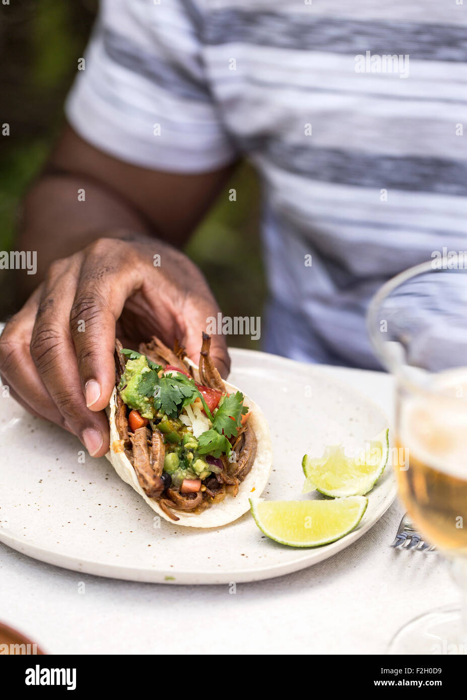 Man eating taco and guacamole hi-res stock photography and images - Alamy