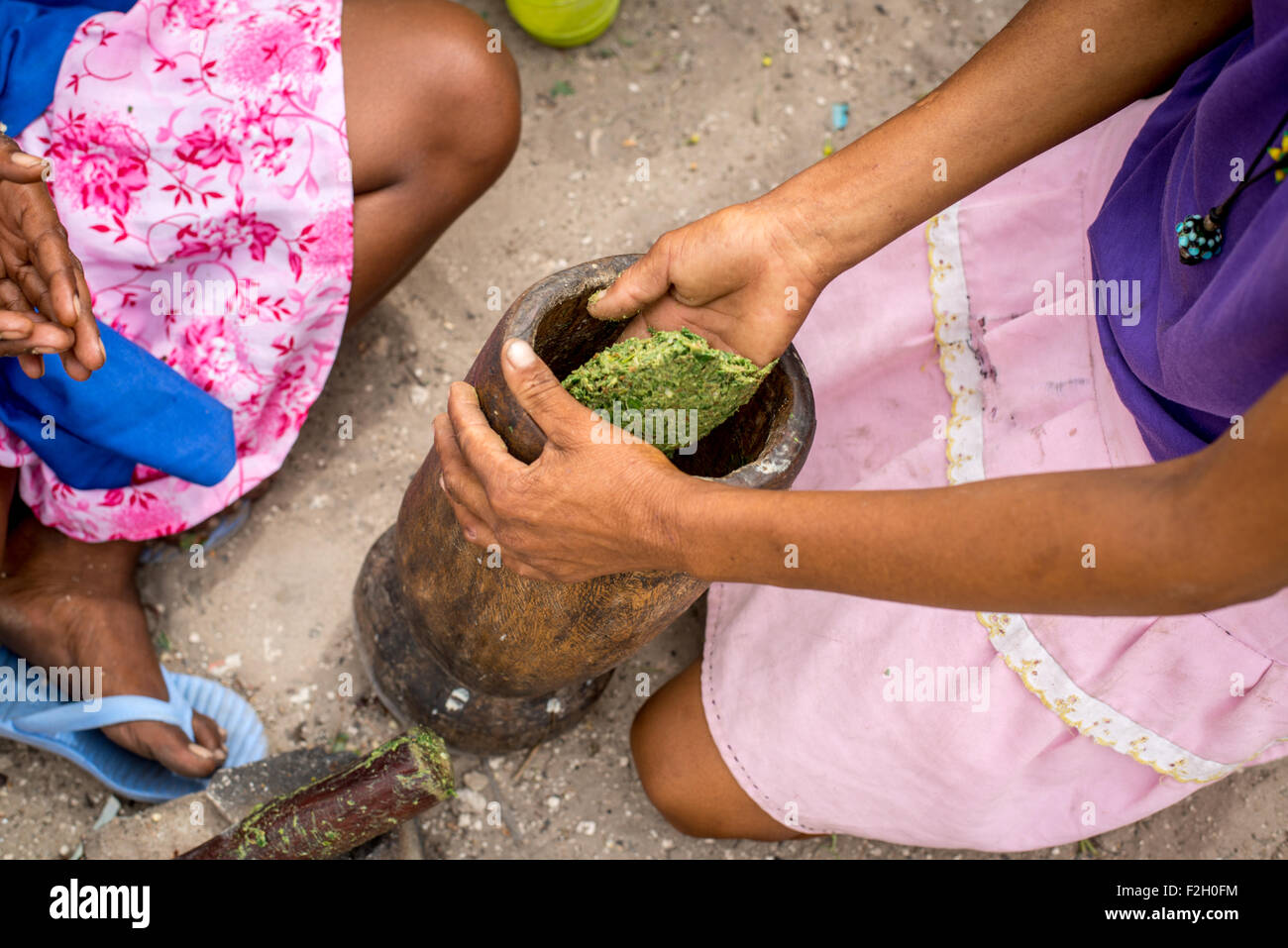 San people making food and eating it in Botswana, Africa Stock Photo ...