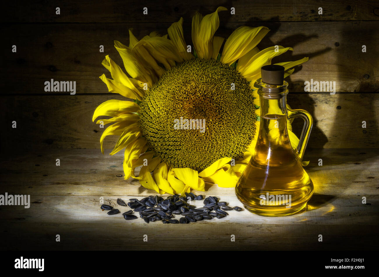 still life with sunflowers, sunflower oil and seeds Stock Photo - Alamy