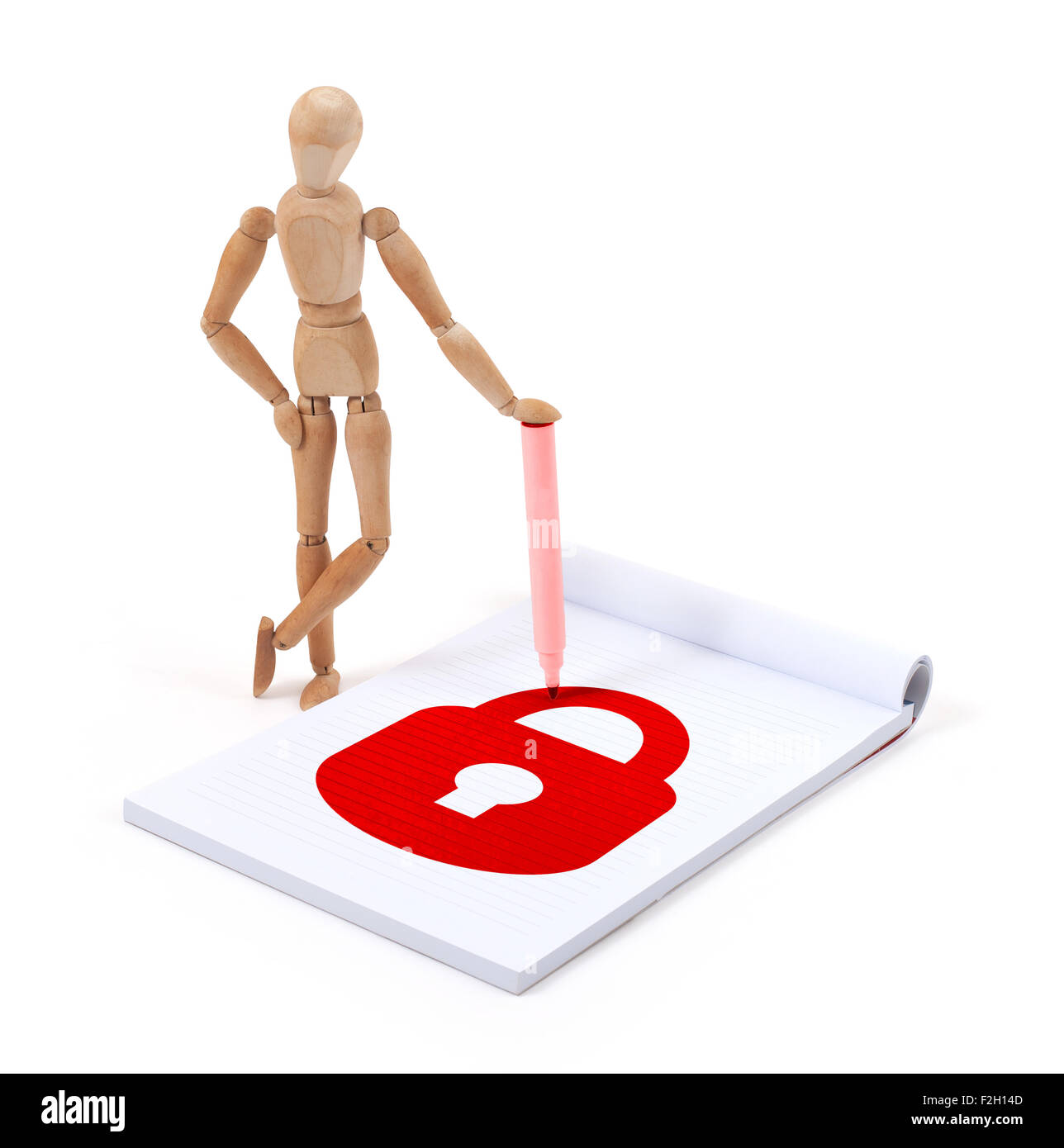 Wooden mannequin writing in a scrapbook - Lock Stock Photo - Alamy