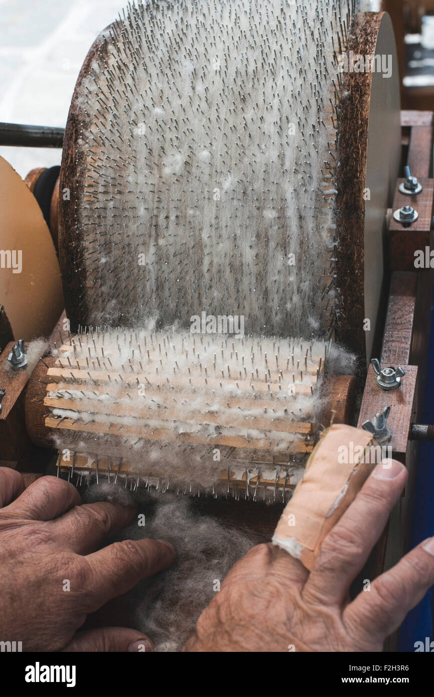 Manual processing of wool Stock Photo - Alamy