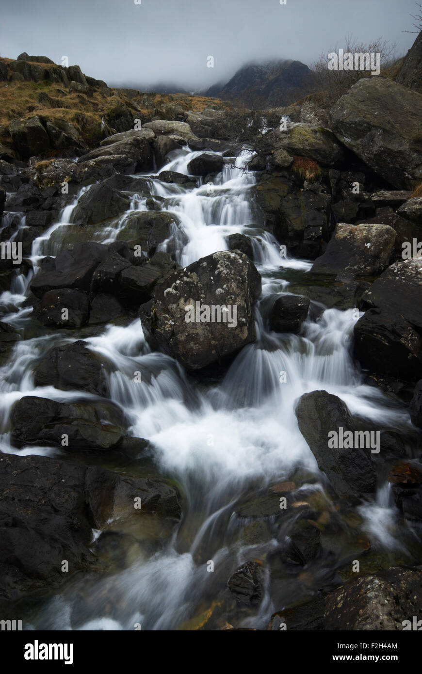 Winter stream runs from mountains hi-res stock photography and images ...