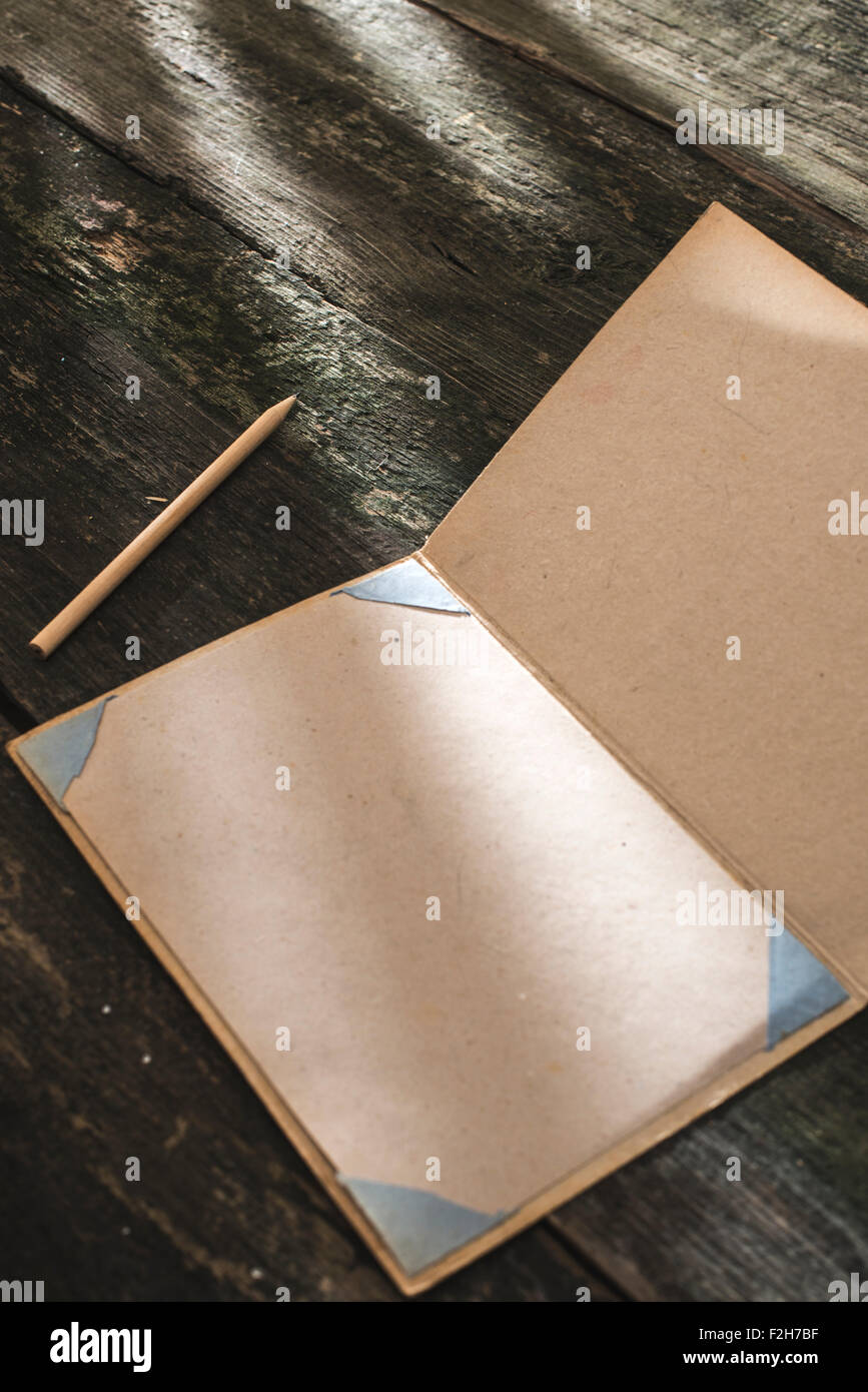 Vintage pencil and drawing paper. Weak sunlight Stock Photo - Alamy