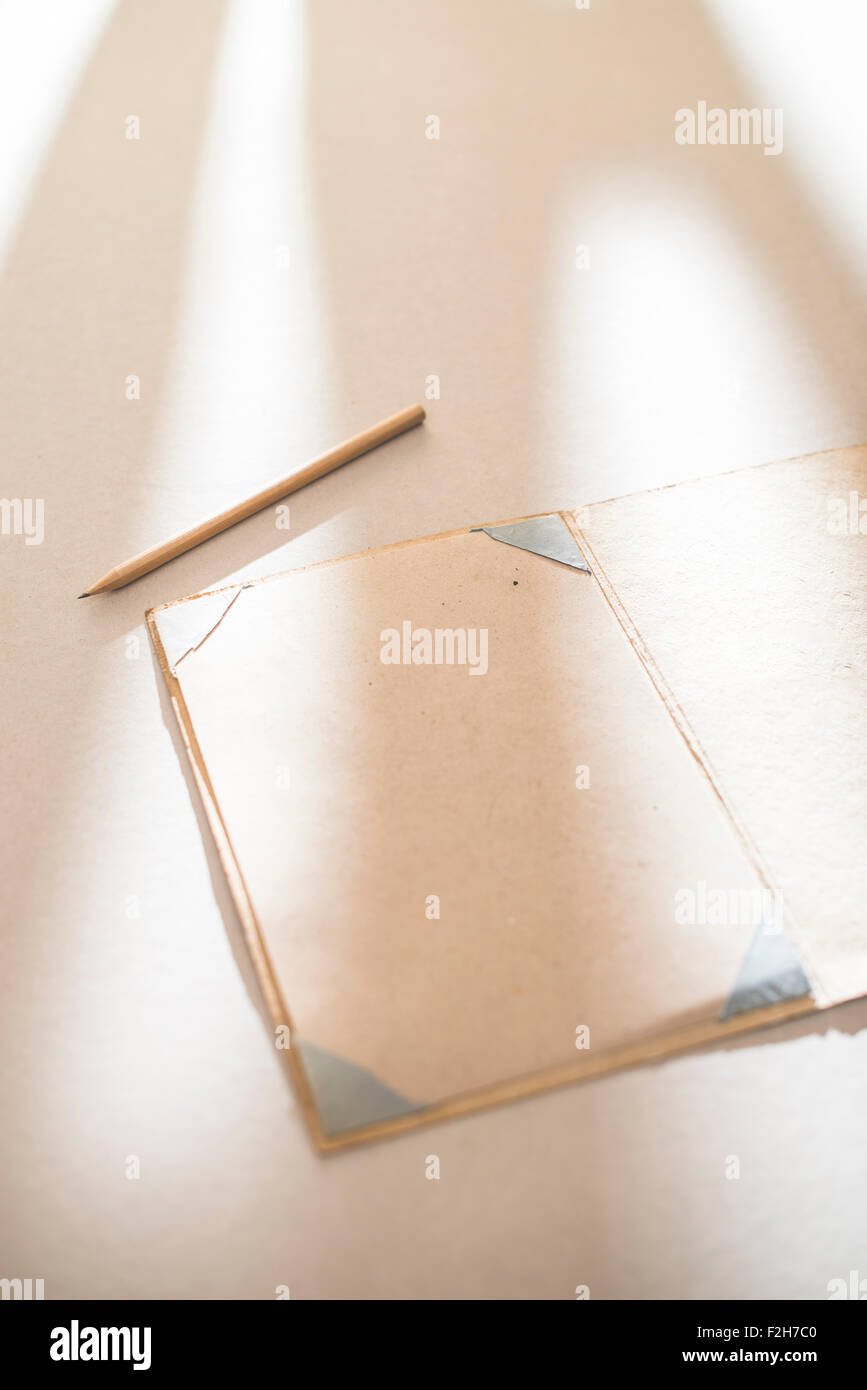 Vintage pencil and drawing paper. Weak sunlight Stock Photo - Alamy