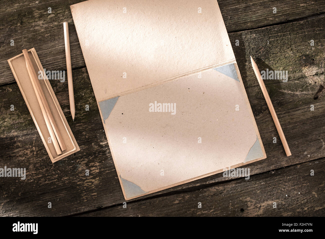 Vintage pencil and drawing paper. Weak sunlight Stock Photo - Alamy