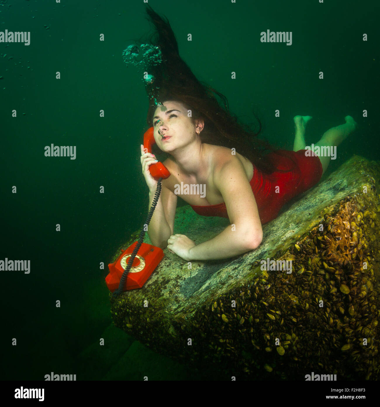 Girl underwater dress hi-res stock photography and images - Alamy