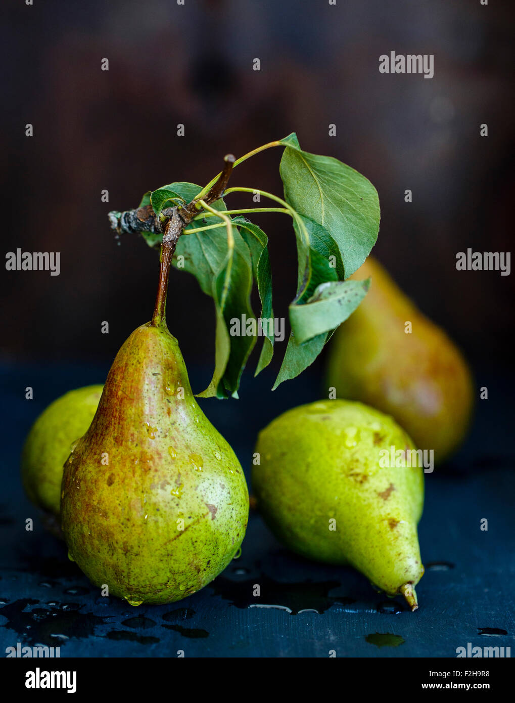 Pears in a rustic background Stock Photo - Alamy
