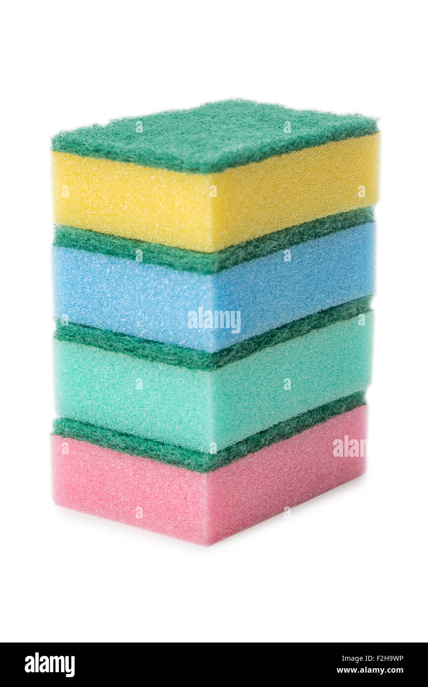 Stack of kitchen sponges in different colors isolated on white ...