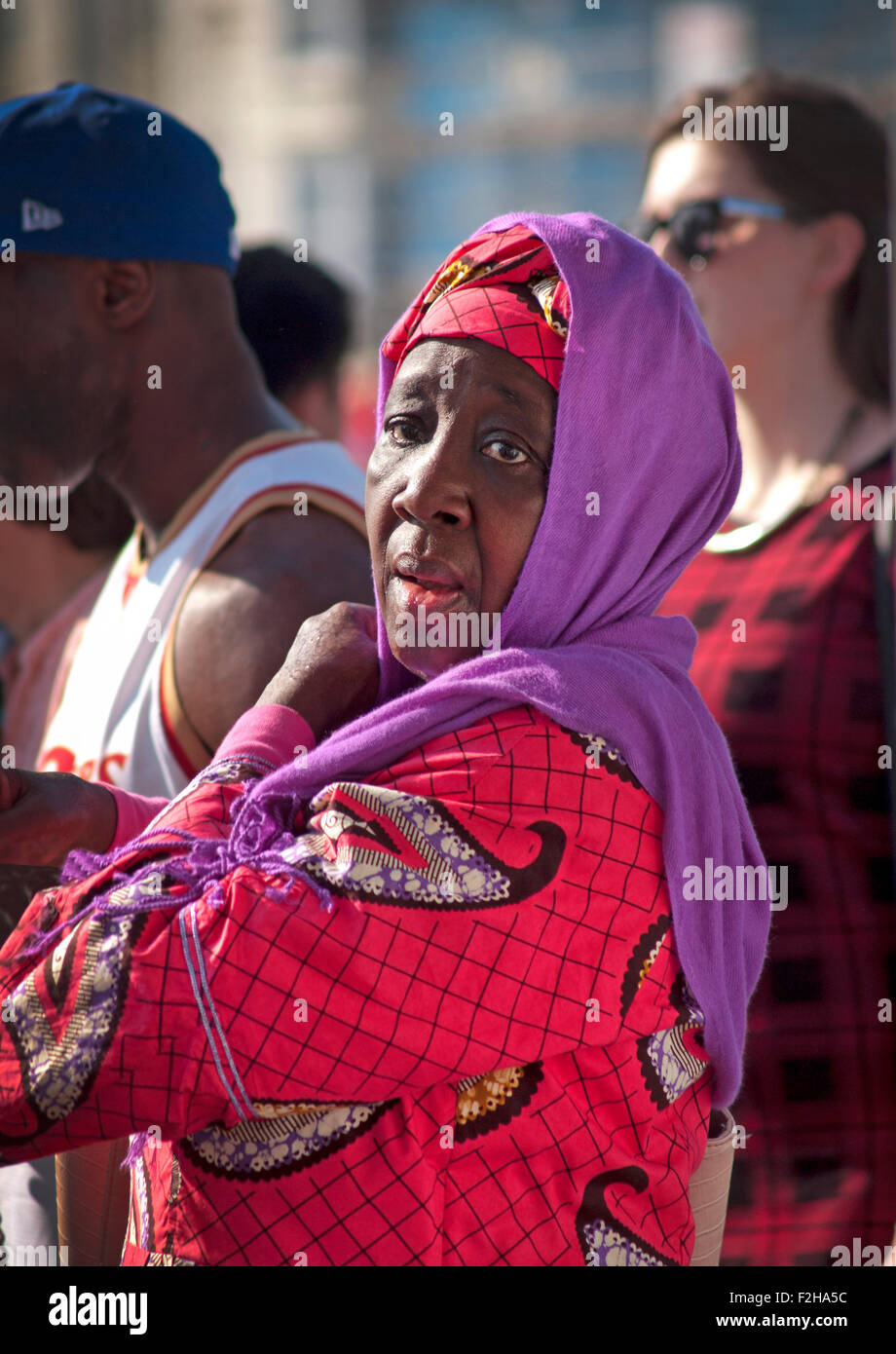Colorful clothes being worn by a visitor to Brighton Stock Photo - Alamy