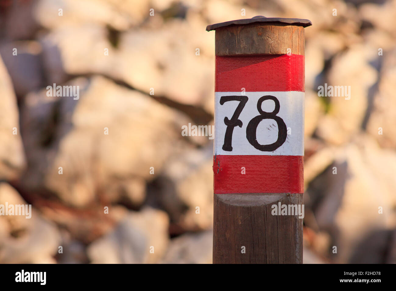 Number seventy eight in a wooden pole Stock Photo - Alamy