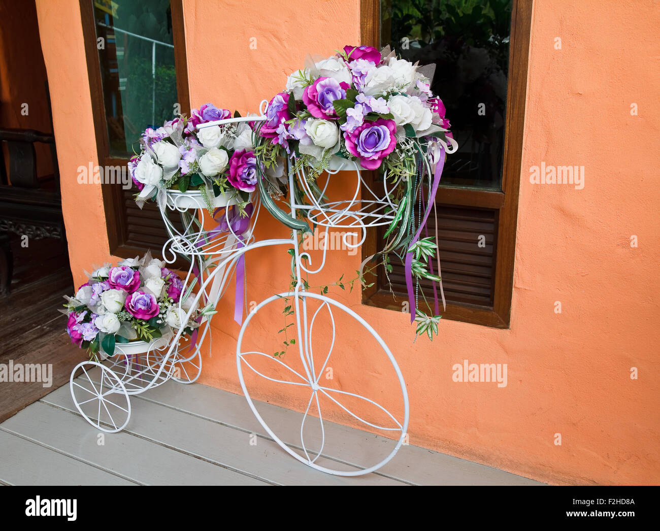 Fake flower on bicycle Stock Photo - Alamy