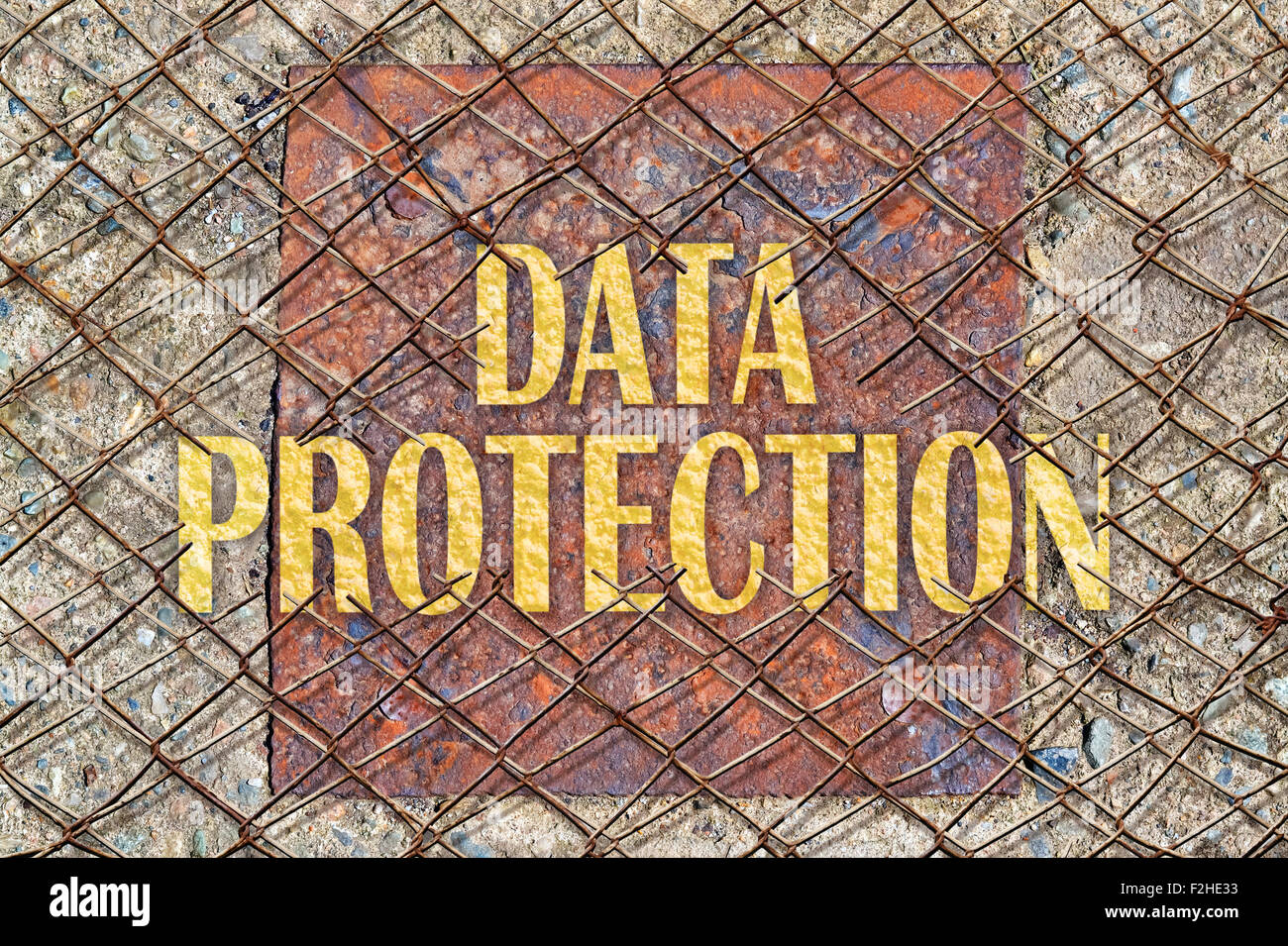 Text Data protection in golden color under a broken wire fence Stock ...