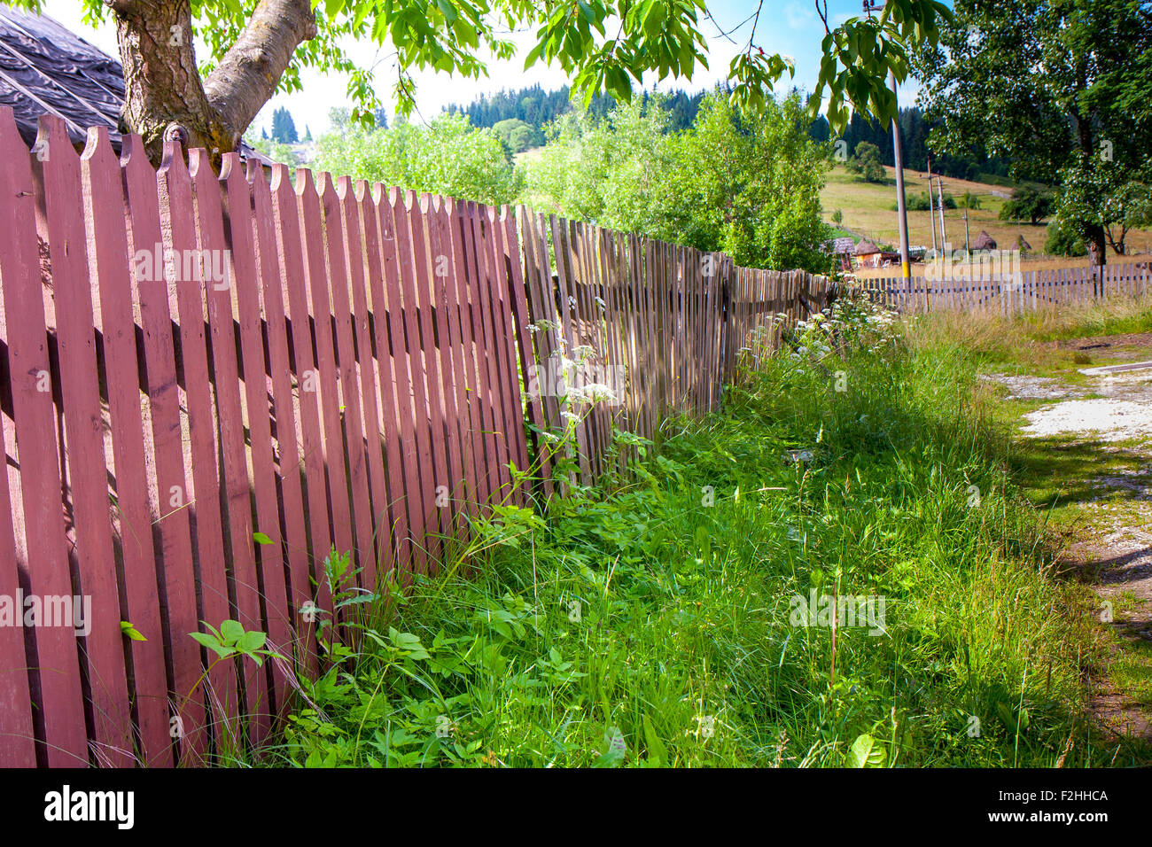 Wooden fence surrounding the house in the Romanian province Stock Photo ...
