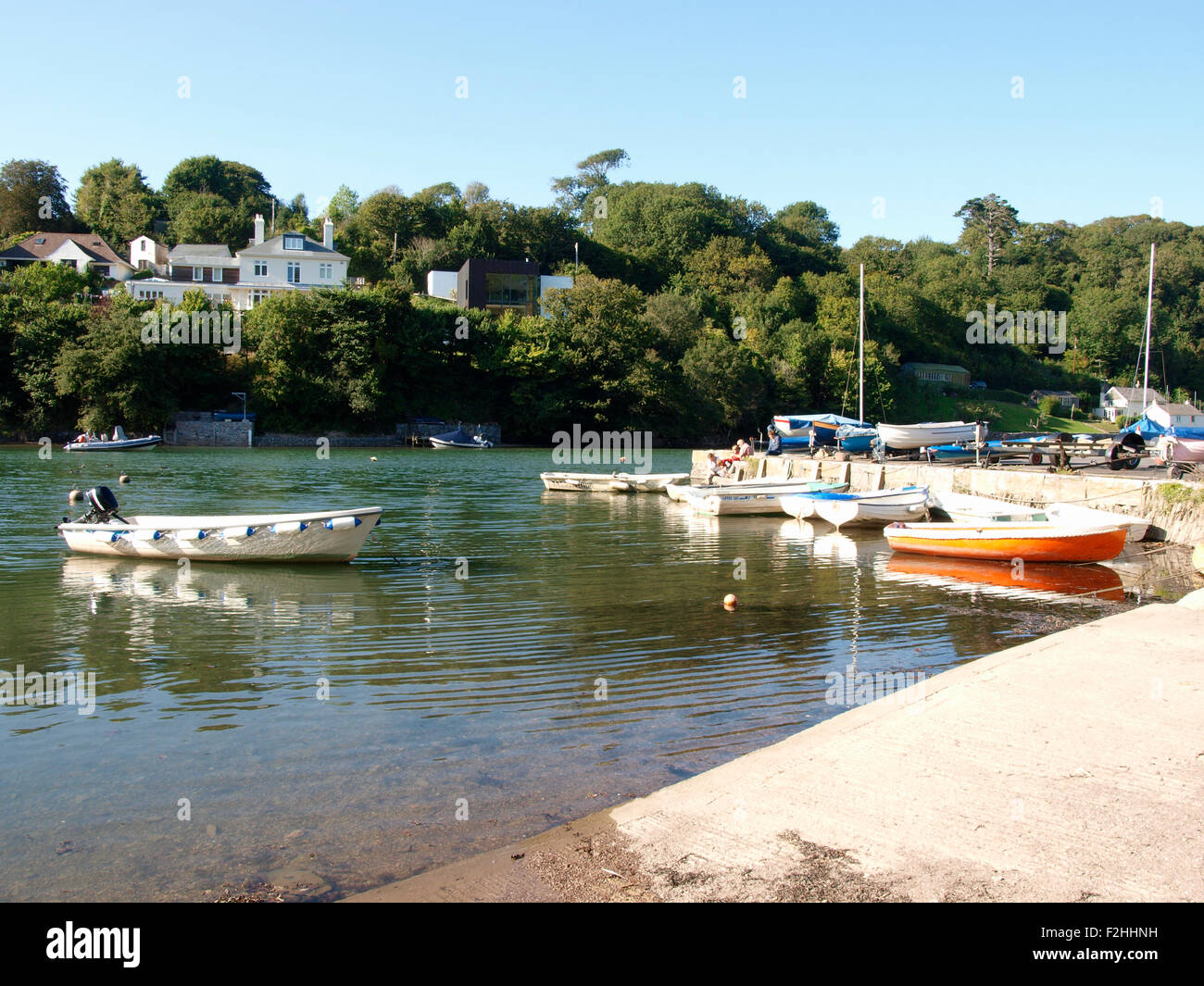Small quay on Newton Creek off the River Yealm at Noss Mayo, Devon, UK ...