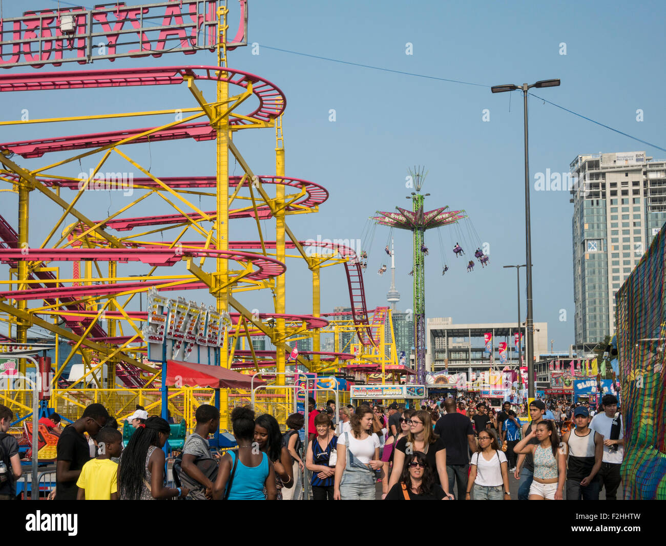 CNE Toronto Summer Exhibition. Visitors and tourists playing carnival ...