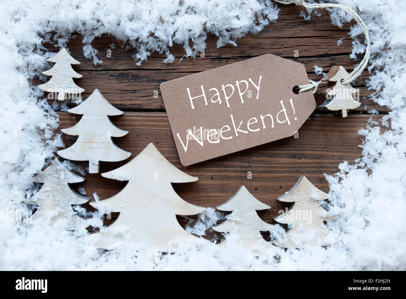 Label Christmas Trees And Snow Happy Weekend Stock Photo - Alamy
