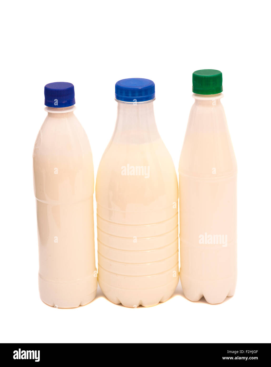 Bottles of milk isolated Stock Photo - Alamy