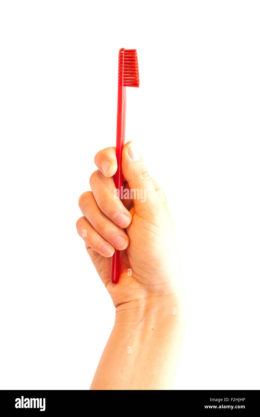 hand holding toothbrush Stock Photo - Alamy