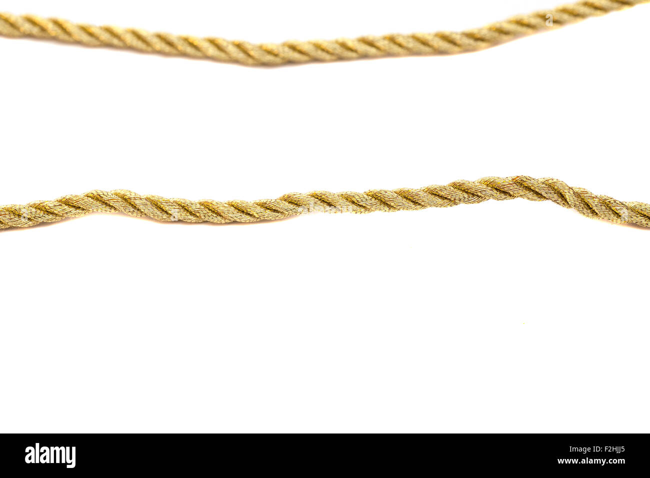 golden rope isolated on white background Stock Photo - Alamy