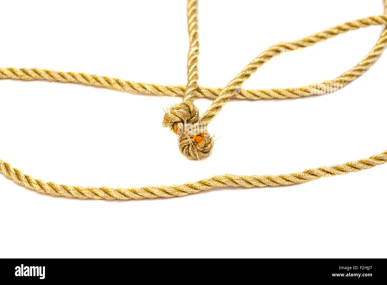 golden rope isolated on white background Stock Photo - Alamy