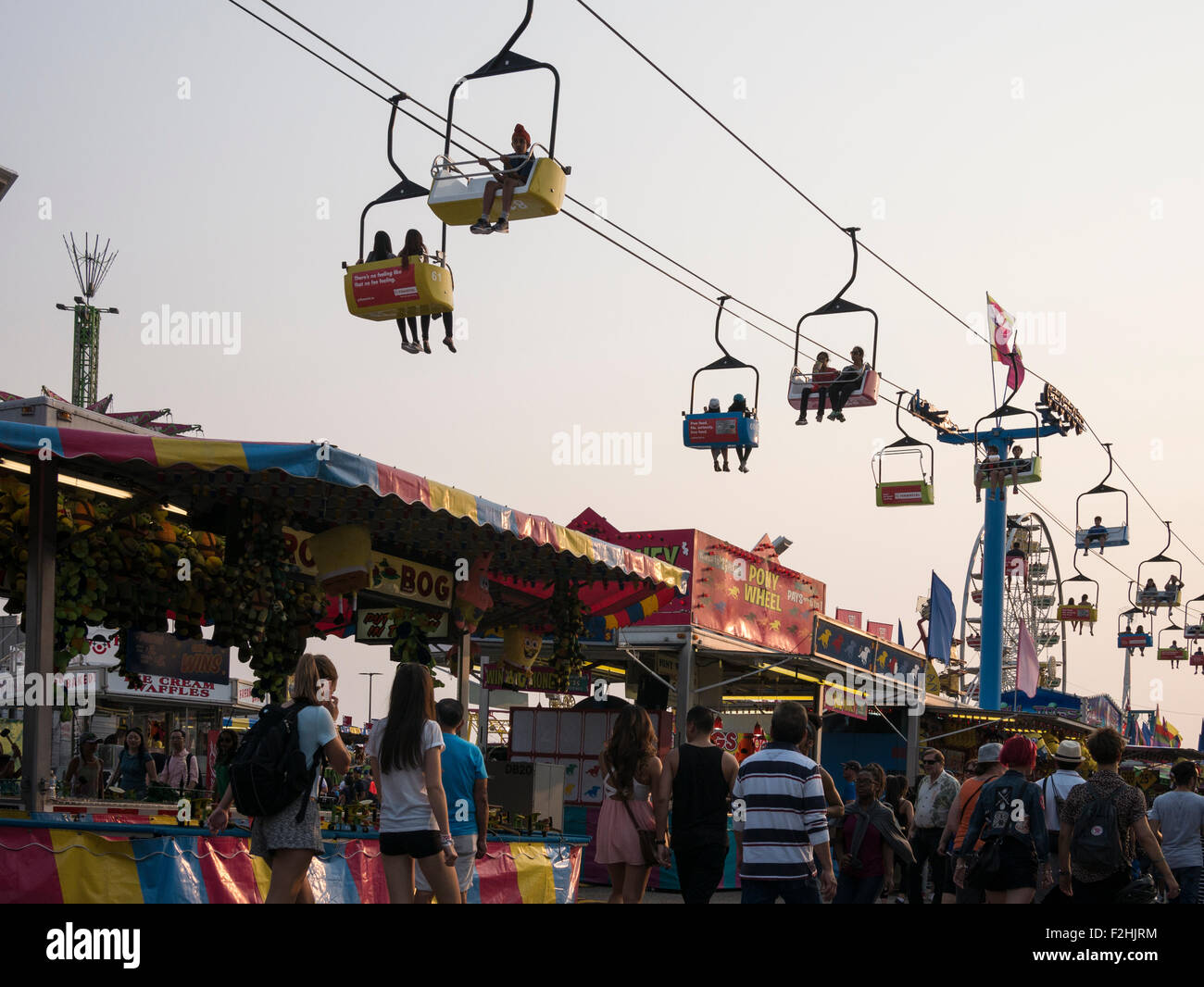 CNE Toronto Summer Exhibition. Visitors and tourists playing carnival ...