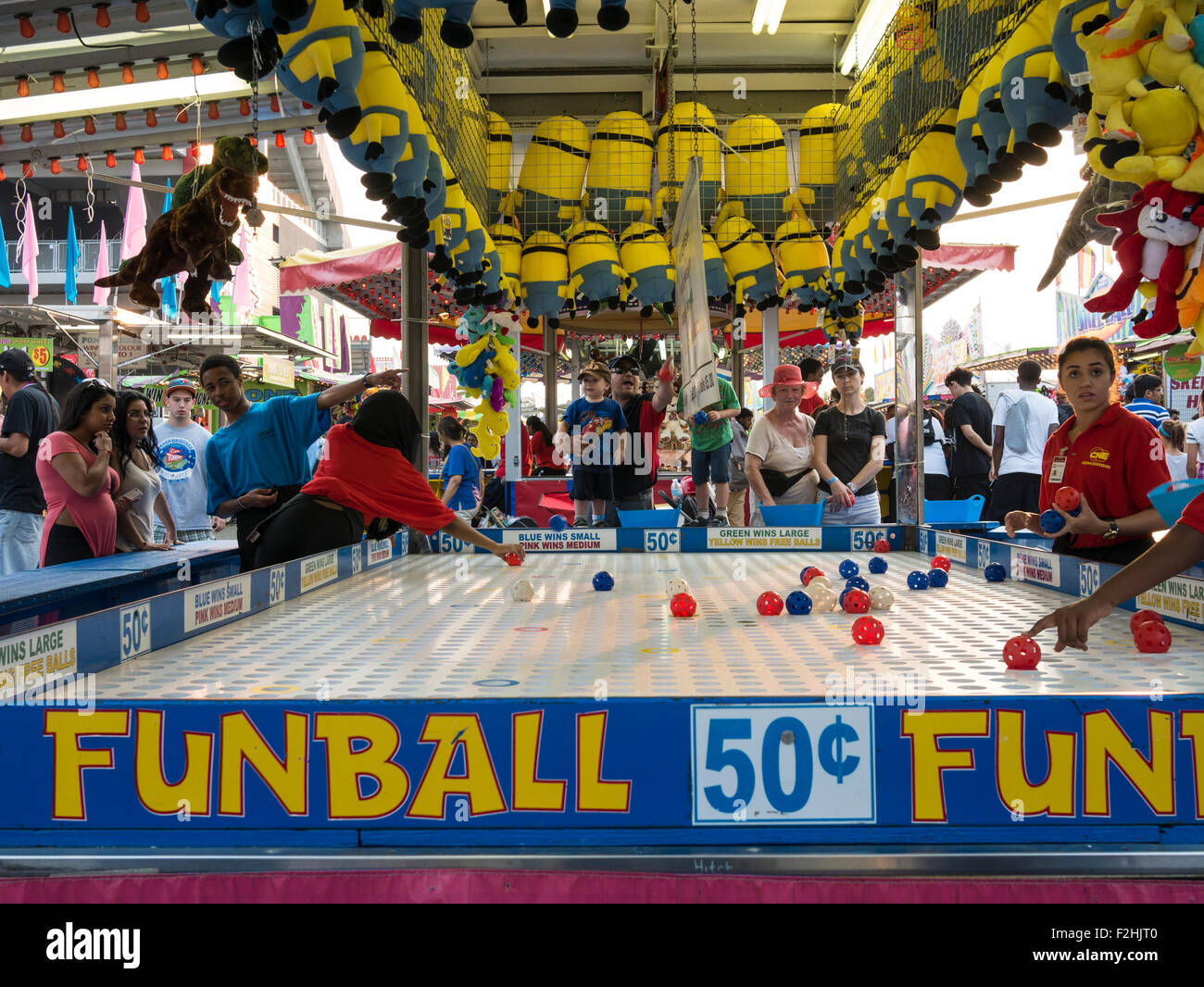 CNE Toronto Summer Exhibition. Visitors and tourists playing carnival ...