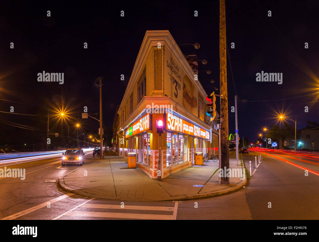 A Pizza Pizza fast food restaurant at night, located where Main St East ...