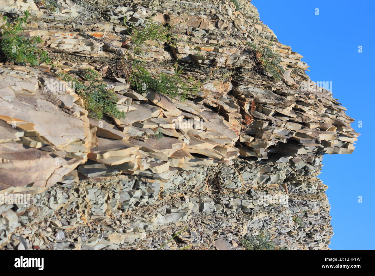 The coastal part of the steep mountain slopes with partially destroyed ...
