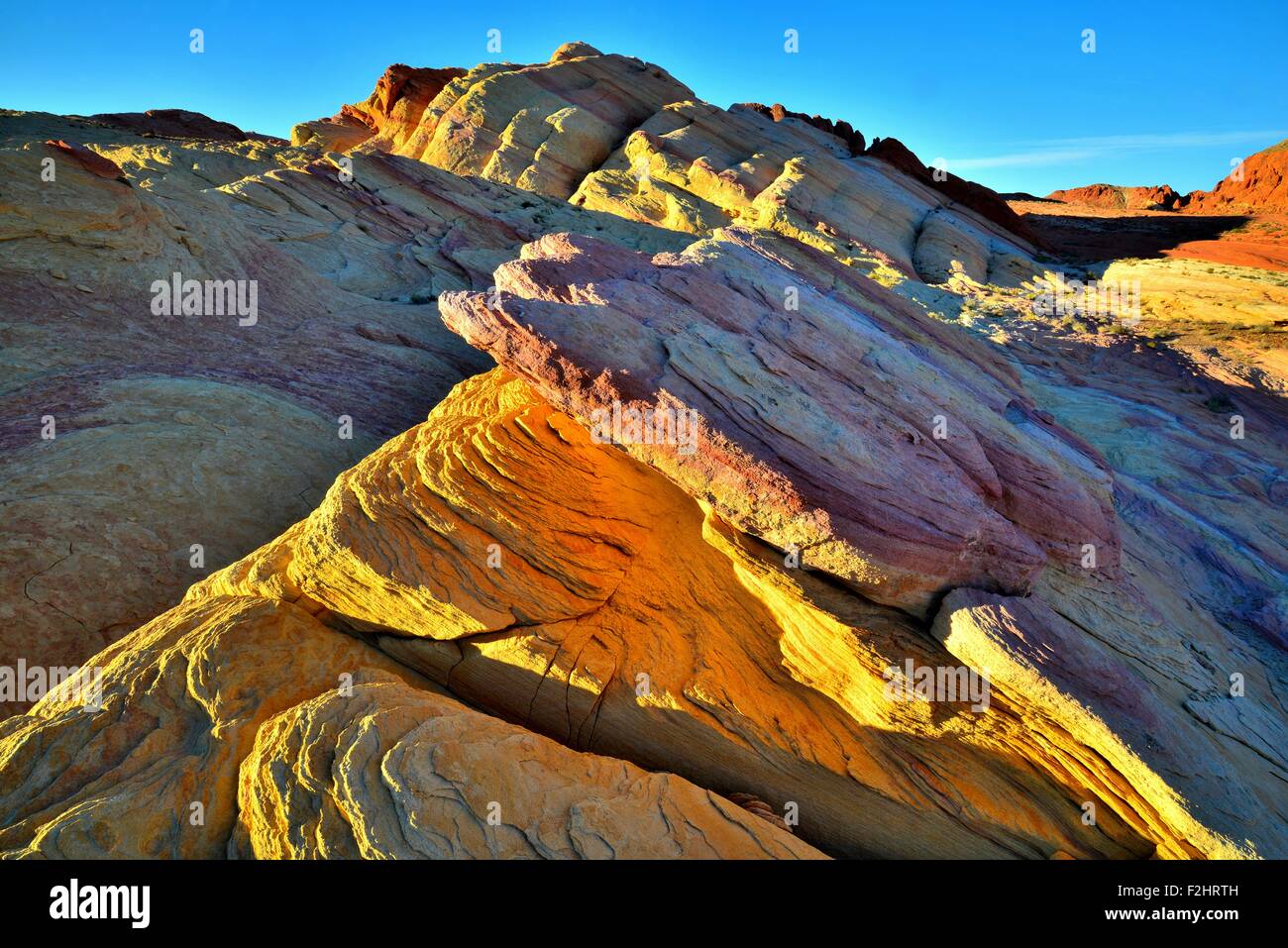 Colorful wavy sandstone shapes, and dunes in Valley of Fire State Park ...