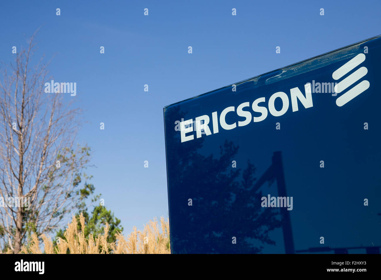 A logo sign outside of a facility occupied by Ericsson in Plano, Texas ...