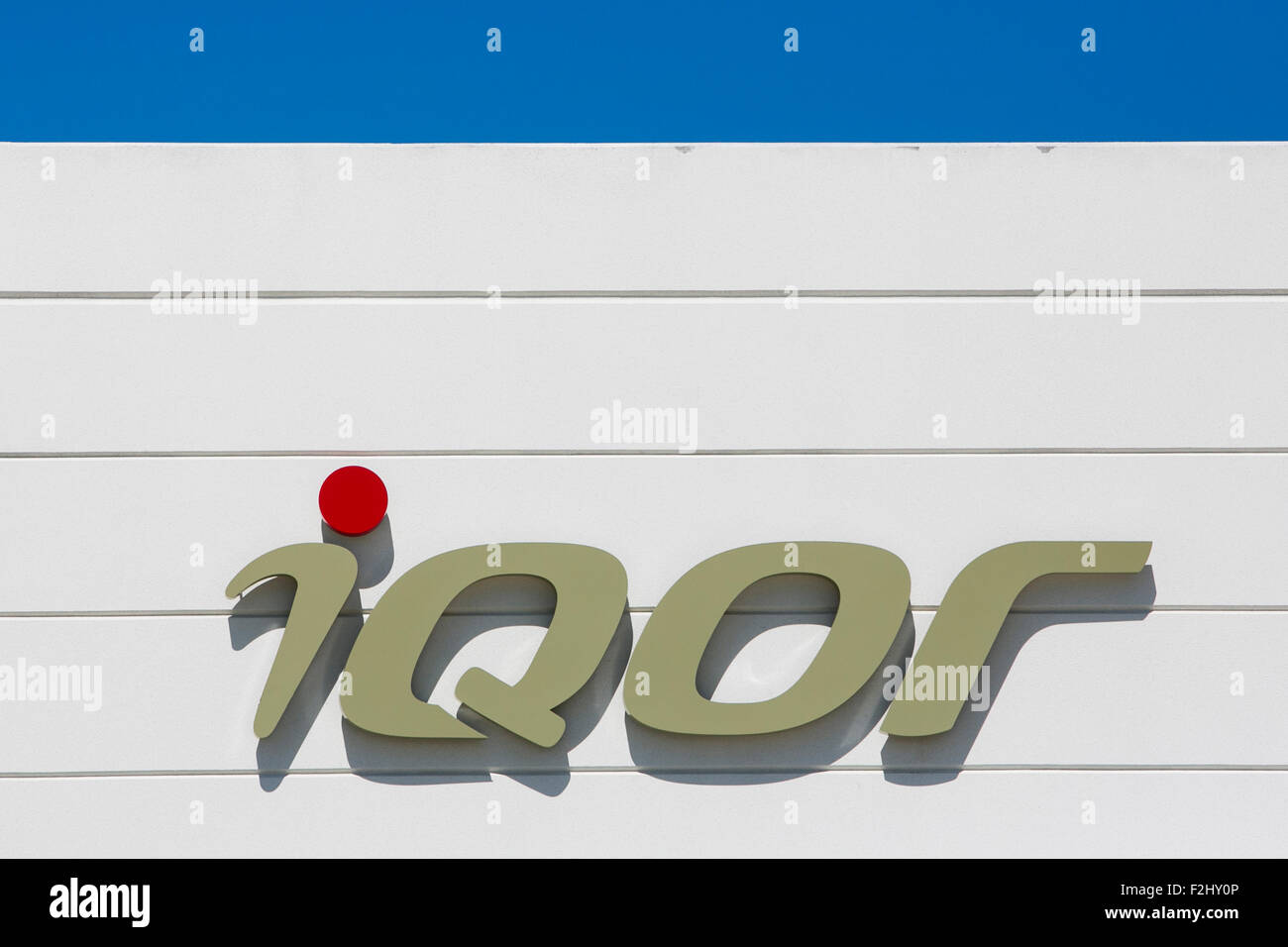 A logo sign outside of a facility occupied by iQor in Plano, Texas on ...