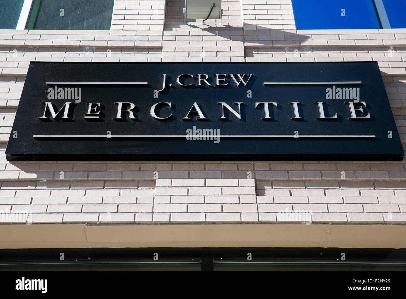 A logo sign outside of a J.Crew Mercantile retail store in Dallas ...
