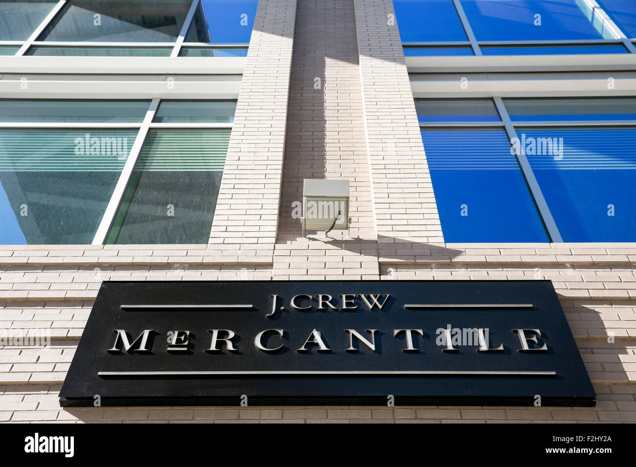 A logo sign outside of a J.Crew Mercantile retail store in Dallas ...