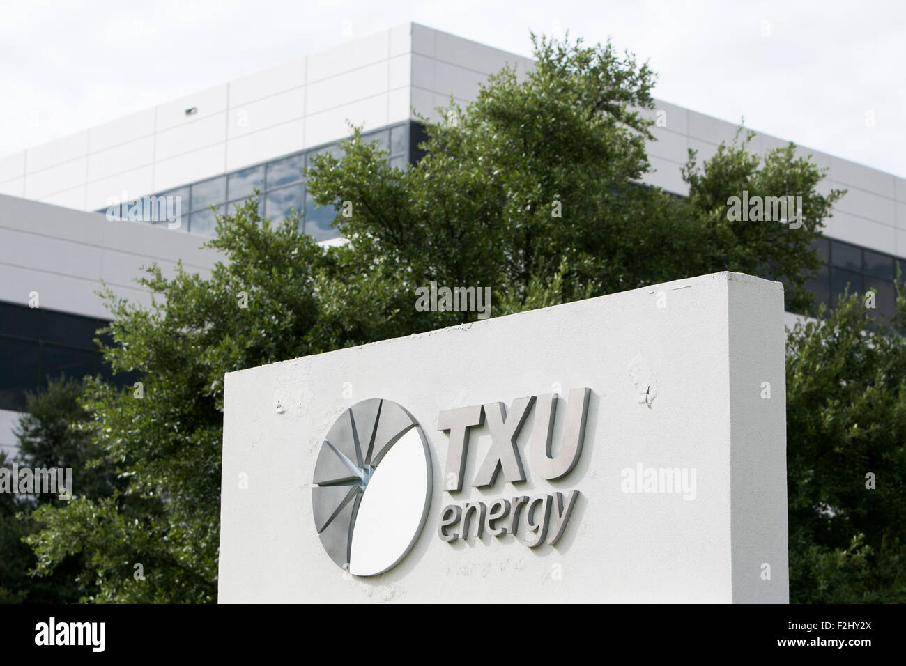 A logo sign outside of a facility occupied by TXU Energy, a subsidiary ...