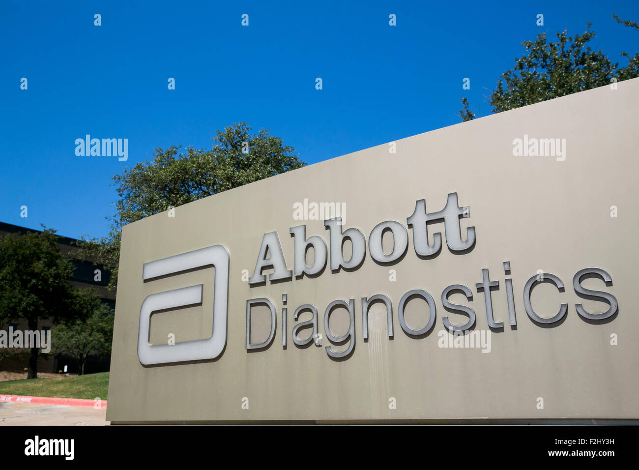 A logo sign outside of a facility occupied by Abbott Diagnostics in ...