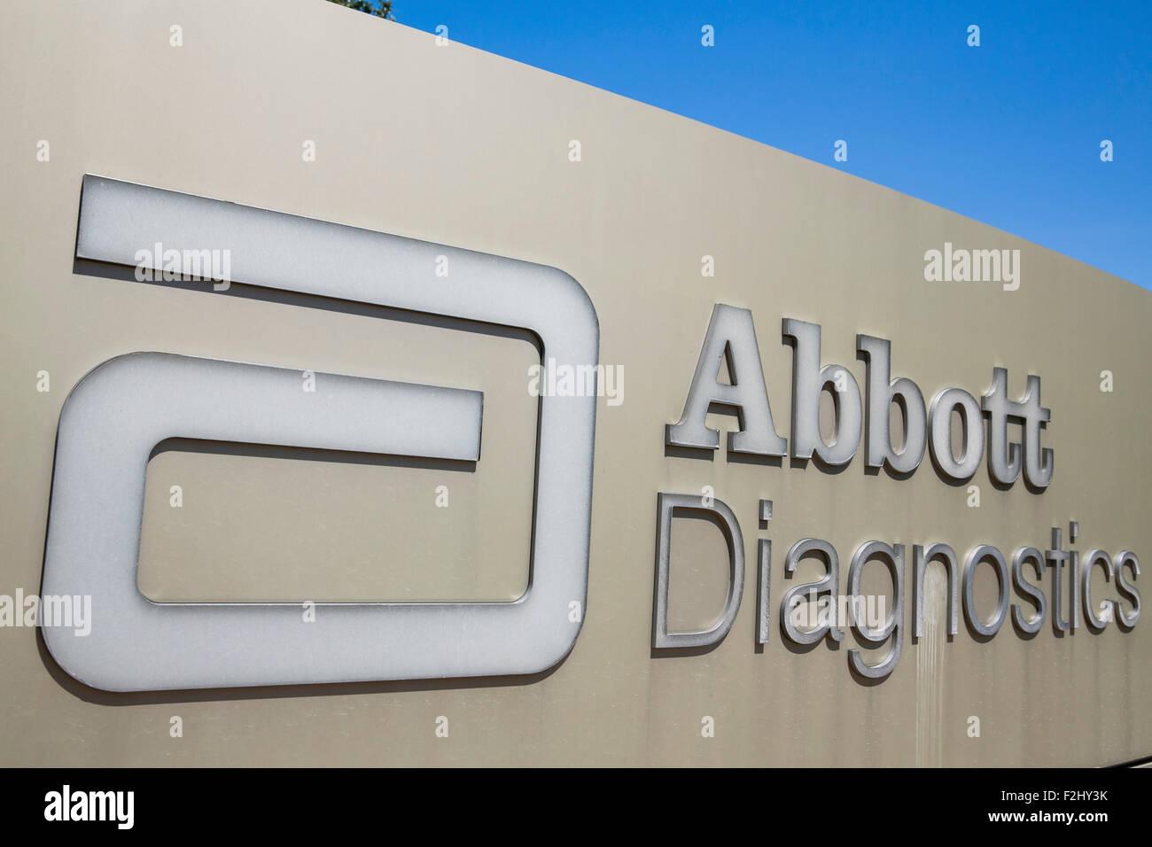 A logo sign outside of a facility occupied by Abbott Diagnostics in ...