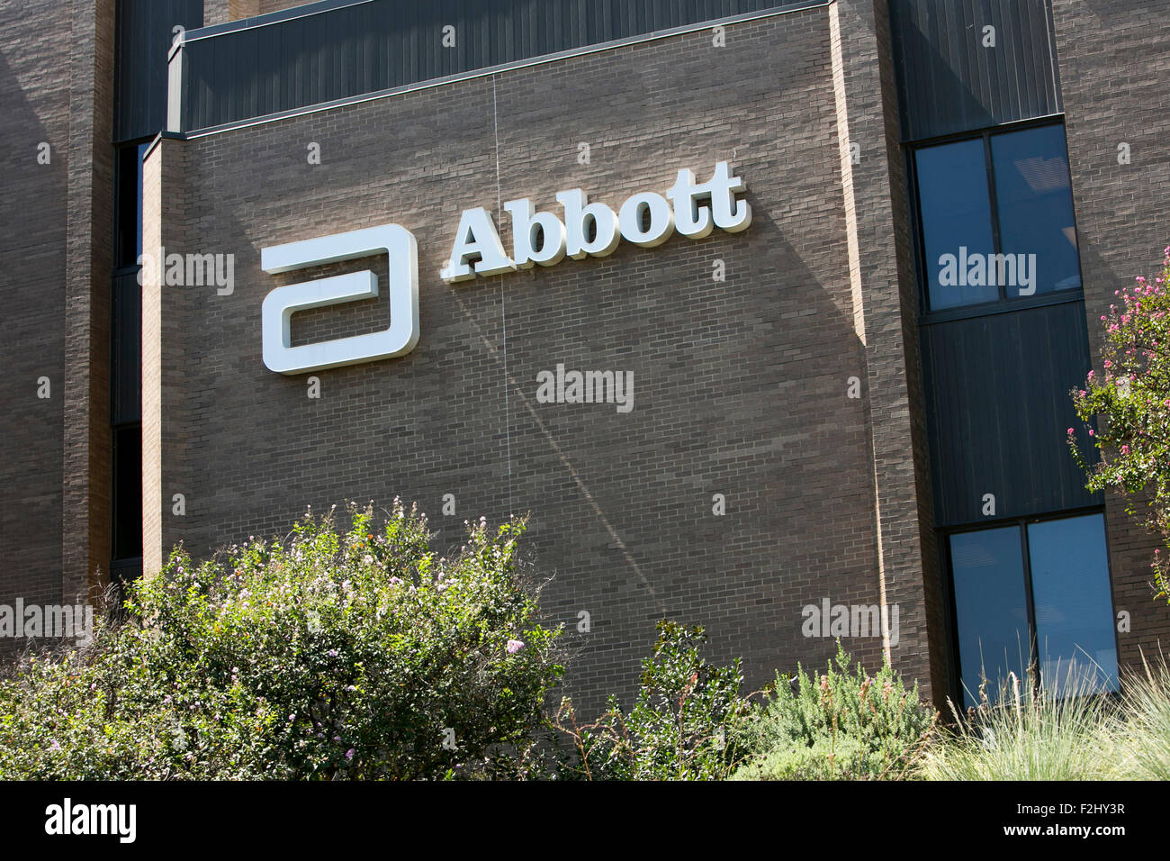 A logo sign outside of a facility occupied by Abbott Diagnostics in ...
