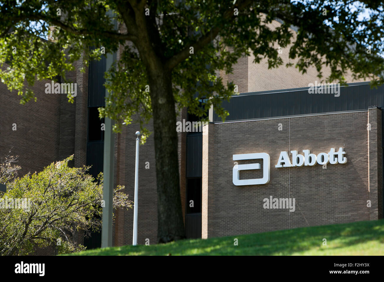 A logo sign outside of a facility occupied by Abbott Diagnostics in ...