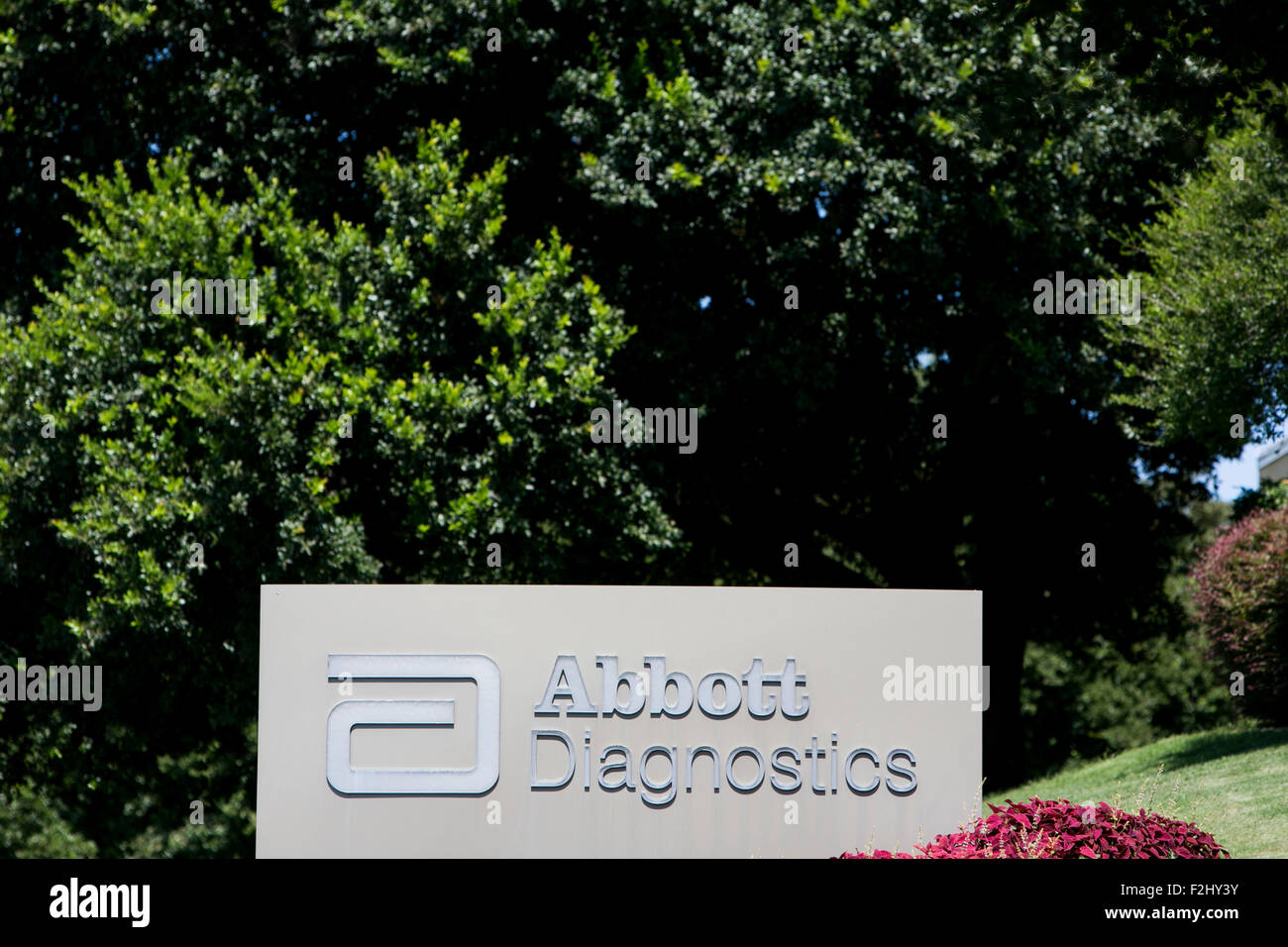 A logo sign outside of a facility occupied by Abbott Diagnostics in ...