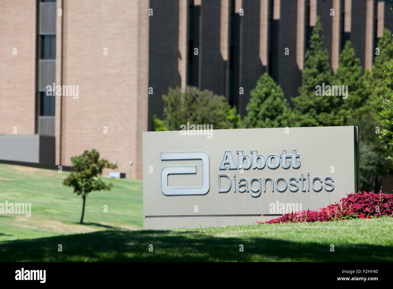 A logo sign outside of a facility occupied by Abbott Diagnostics in ...