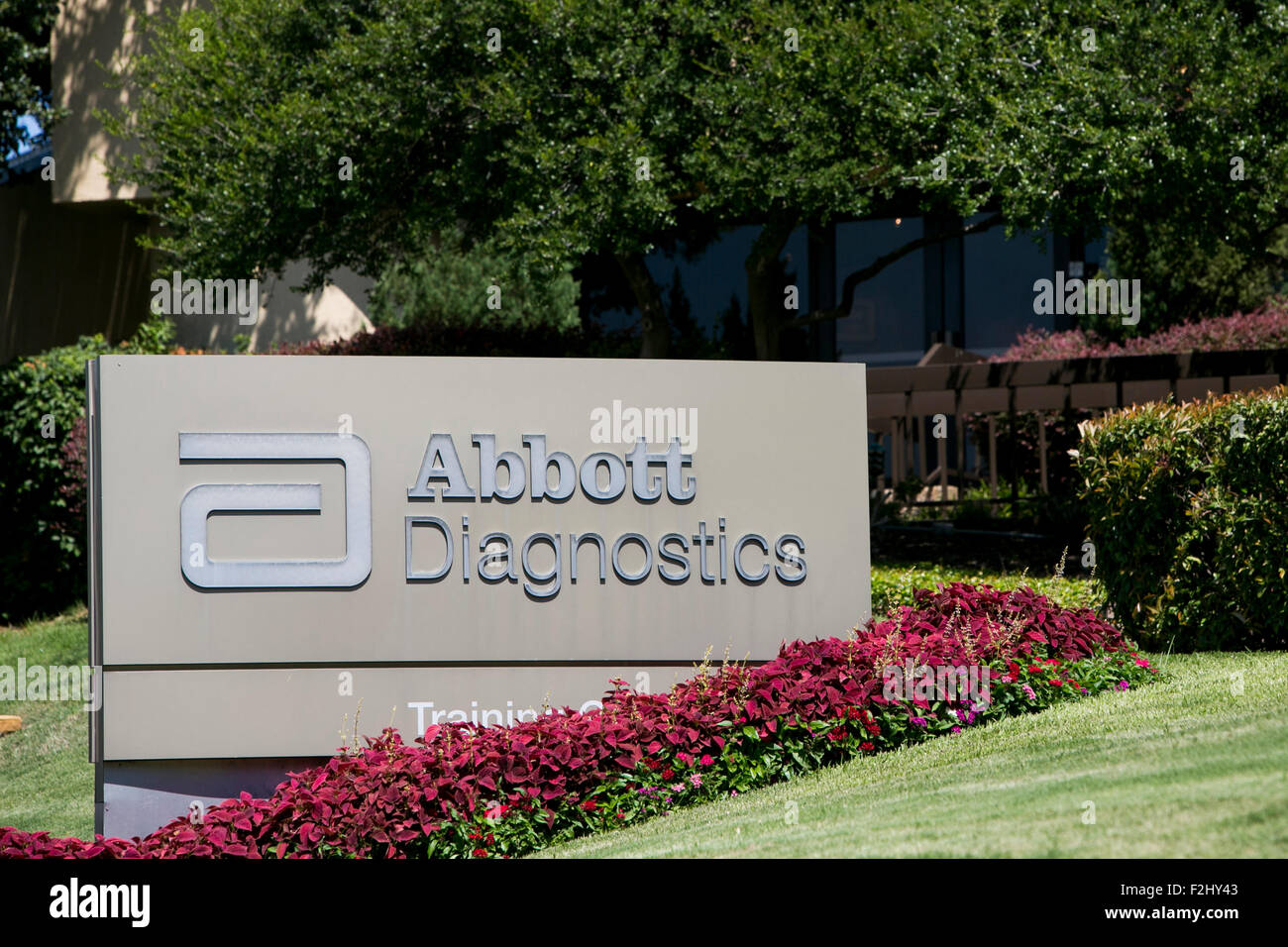 A logo sign outside of a facility occupied by Abbott Diagnostics in ...