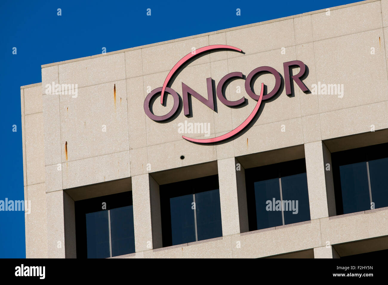 A logo sign outside of a facility occupied by Oncor Electric Delivery ...