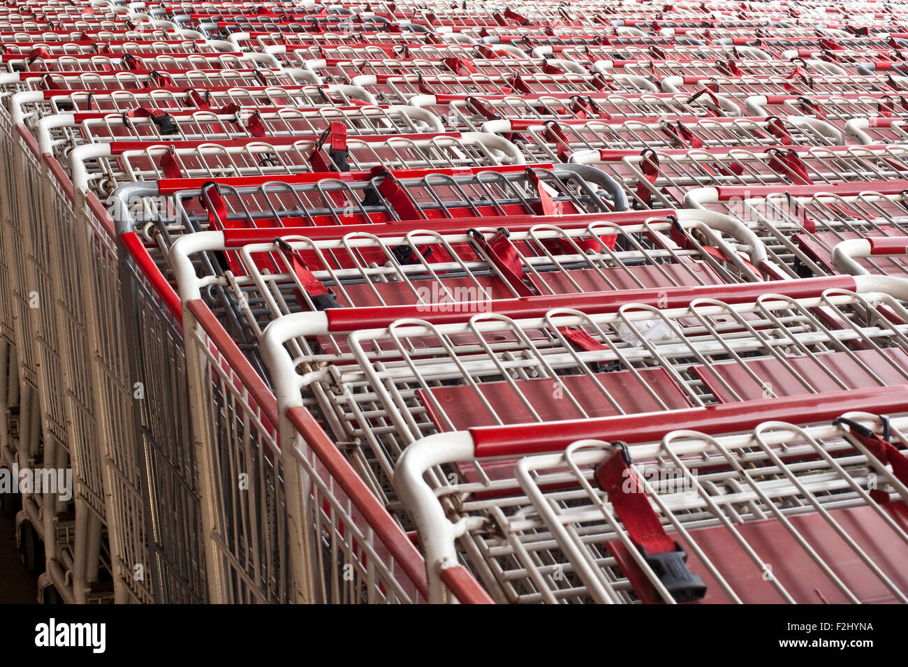 Rows of shopping carts outside store patterns of metal Stock Photo - Alamy