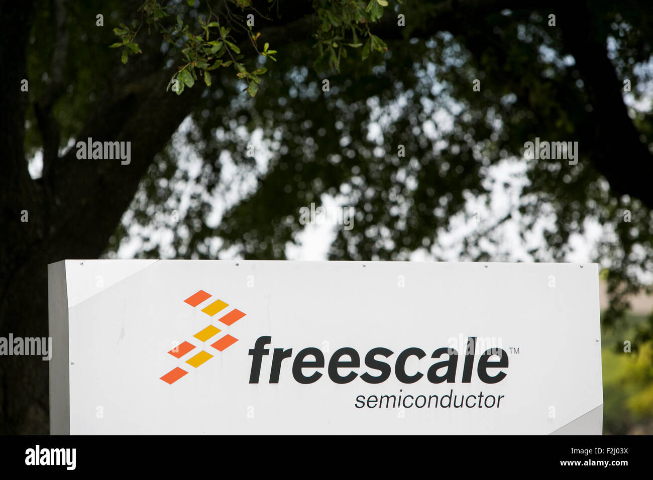 A logo sign outside of the headquarters of Freescale Semiconductor Inc., in Austin, Texas on ...