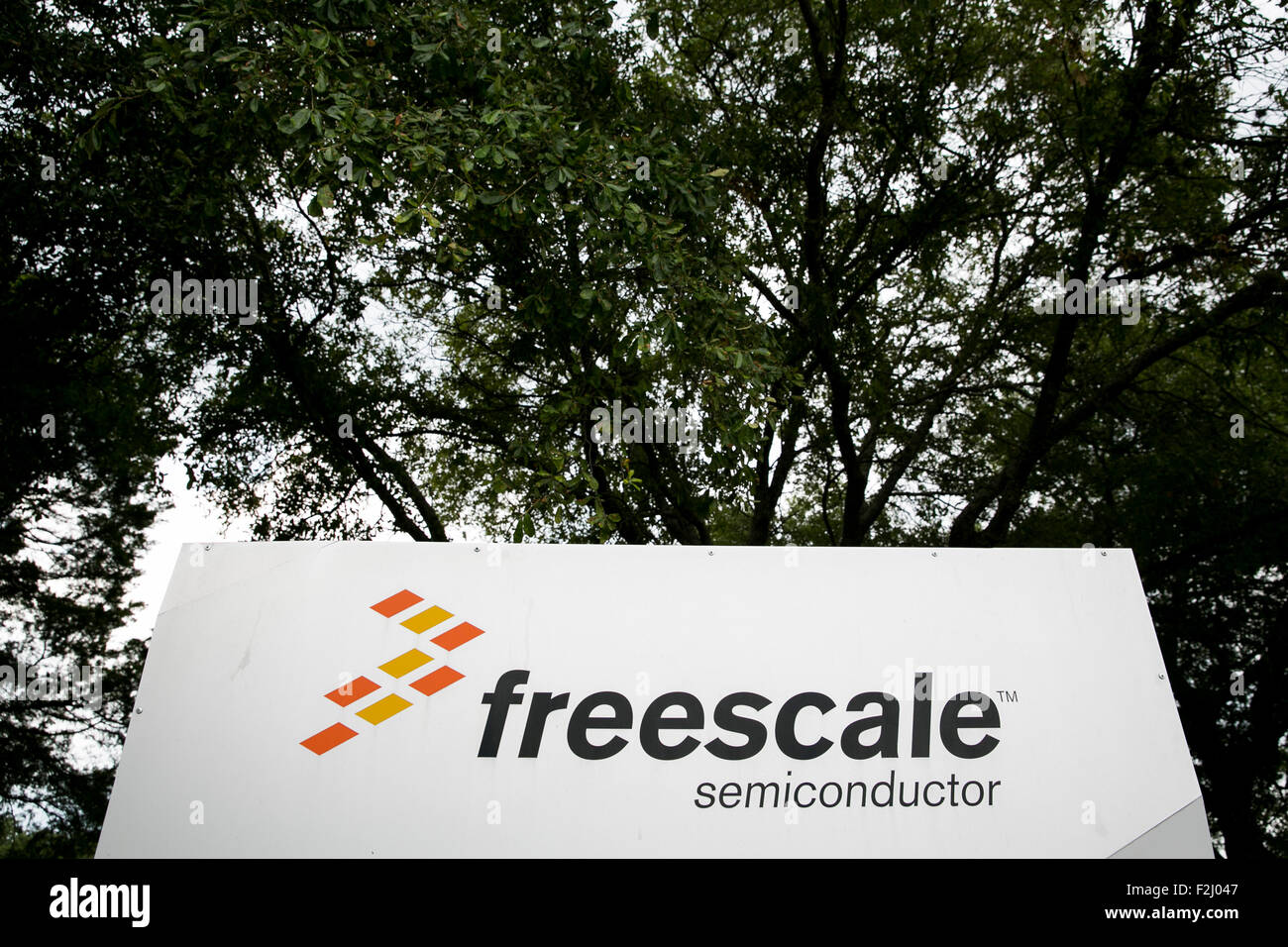 A logo sign outside of the headquarters of Freescale Semiconductor Inc., in Austin, Texas on ...