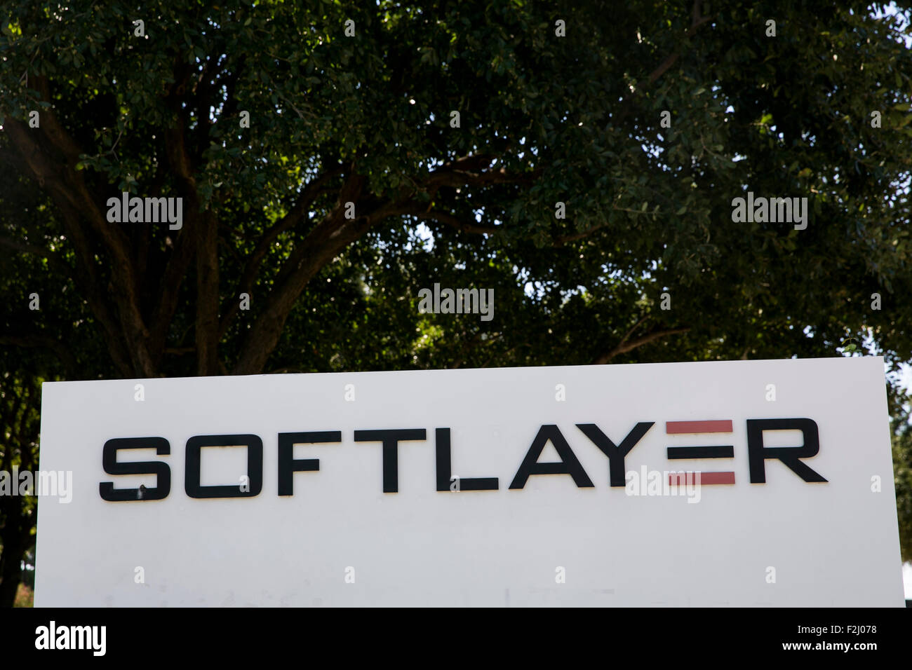 A logo sign outside of the headquarters of SoftLayer Technologies, Inc ...