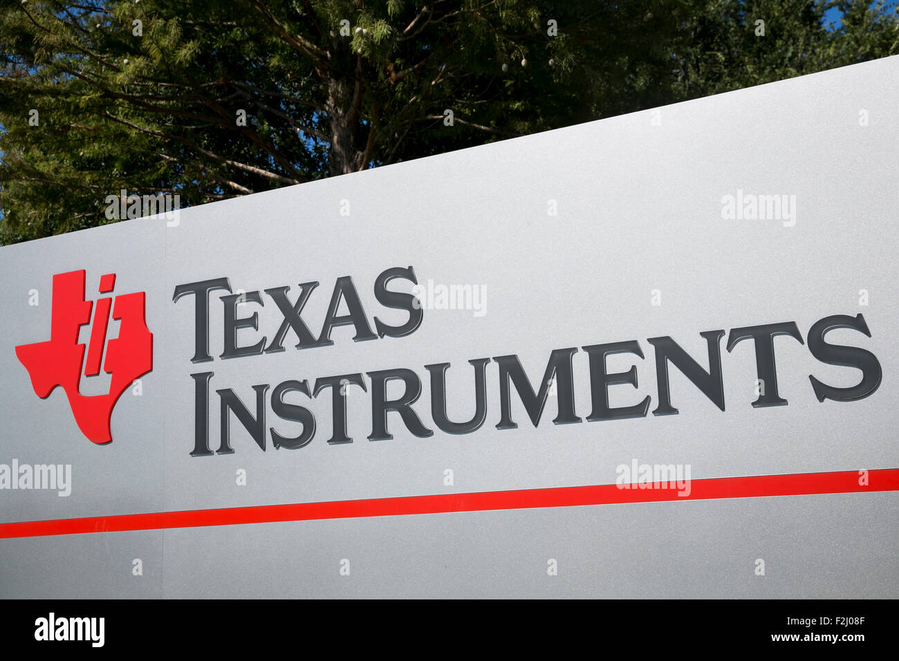 A logo sign outside of the headquarters of Texas Instruments in Dallas ...