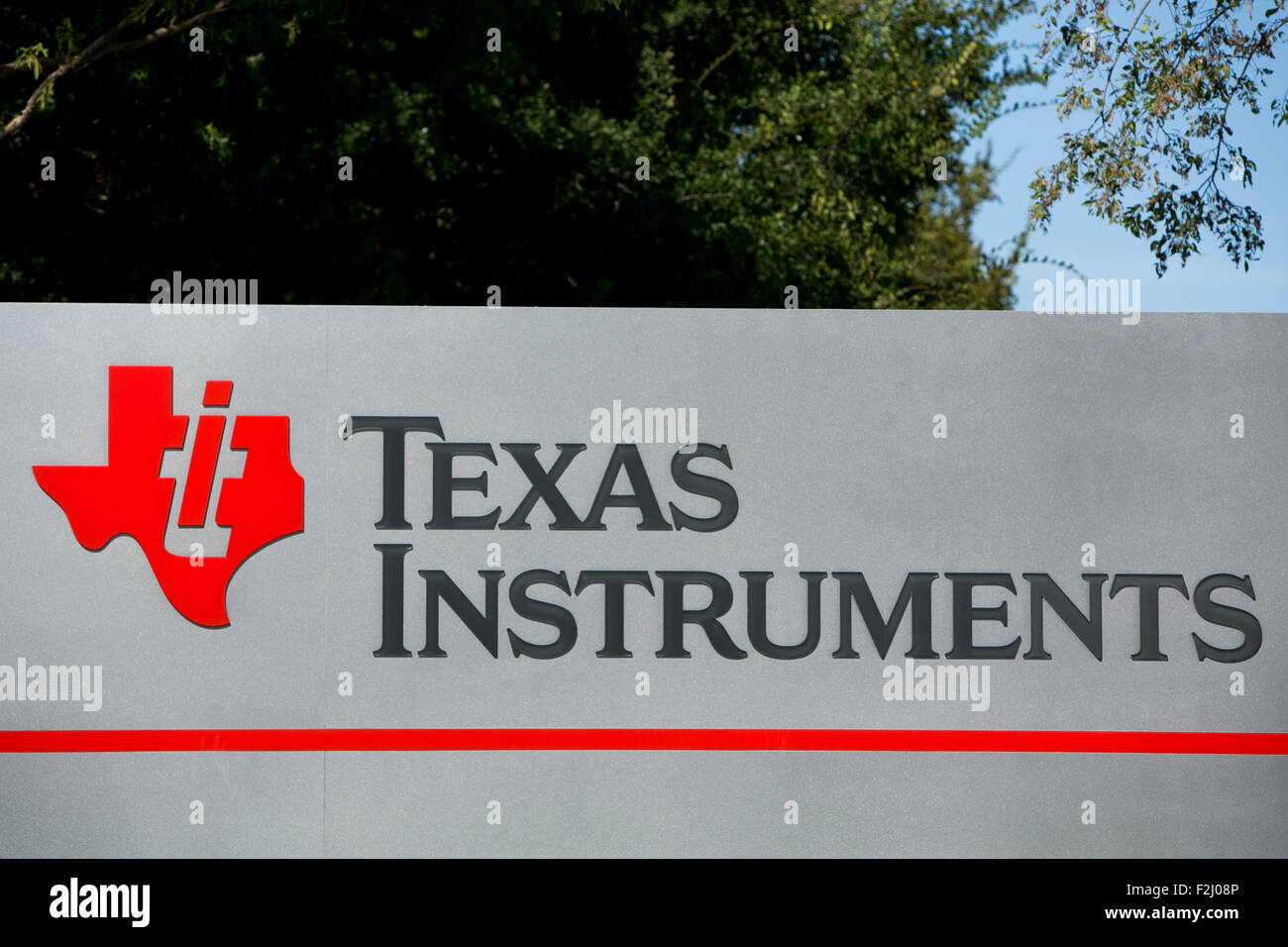 A logo sign outside of the headquarters of Texas Instruments in Dallas ...