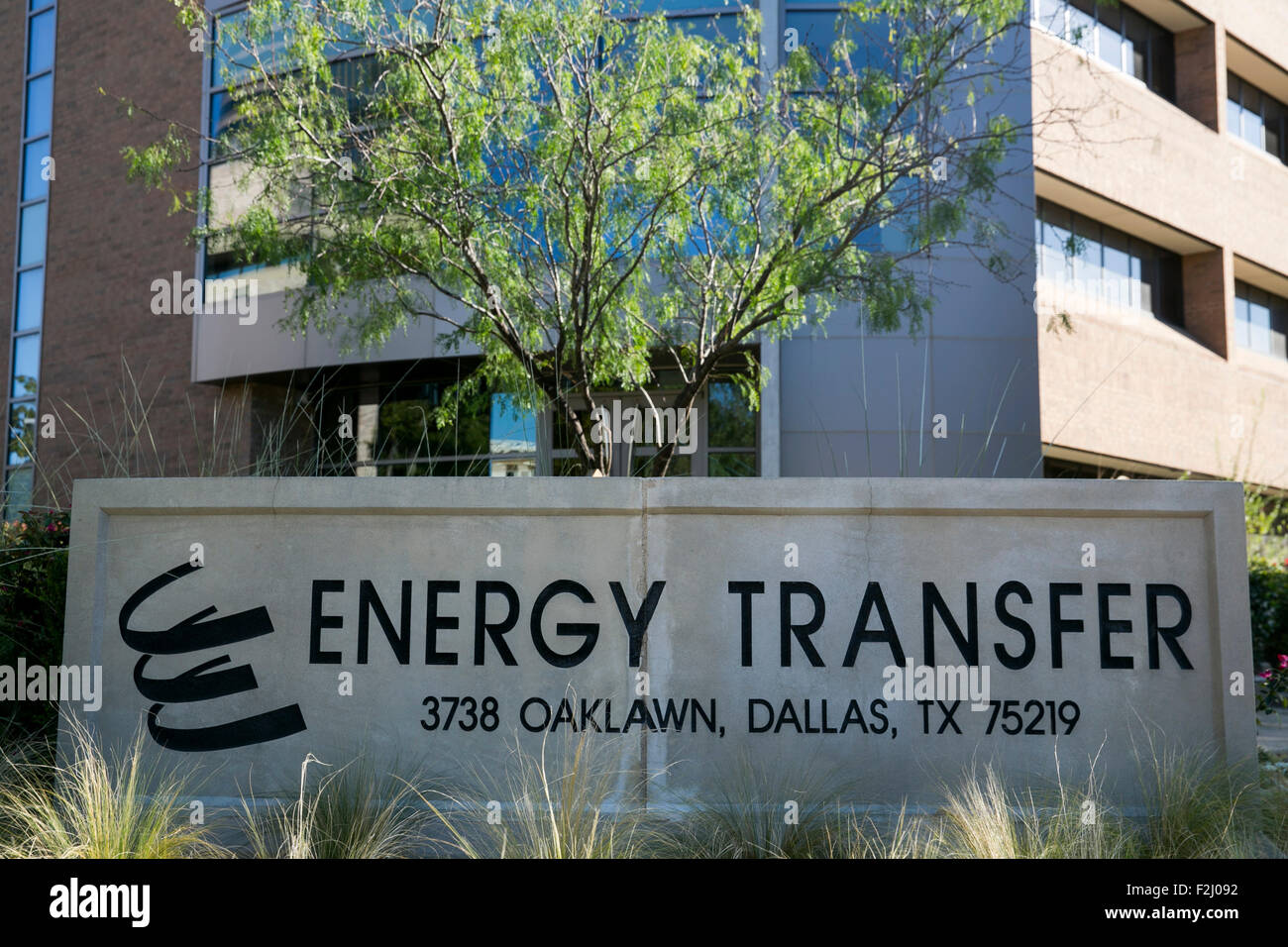 A logo sign outside of the headquarters of Energy Transfer Equity in ...