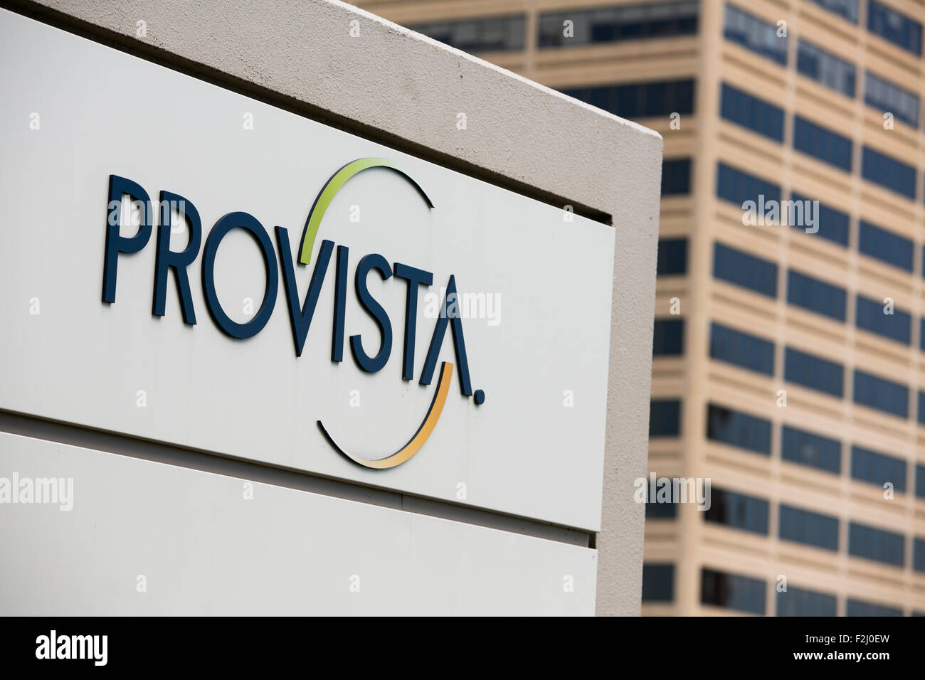 A logo sign outside of the headquarters of VHA, Inc., the parent ...